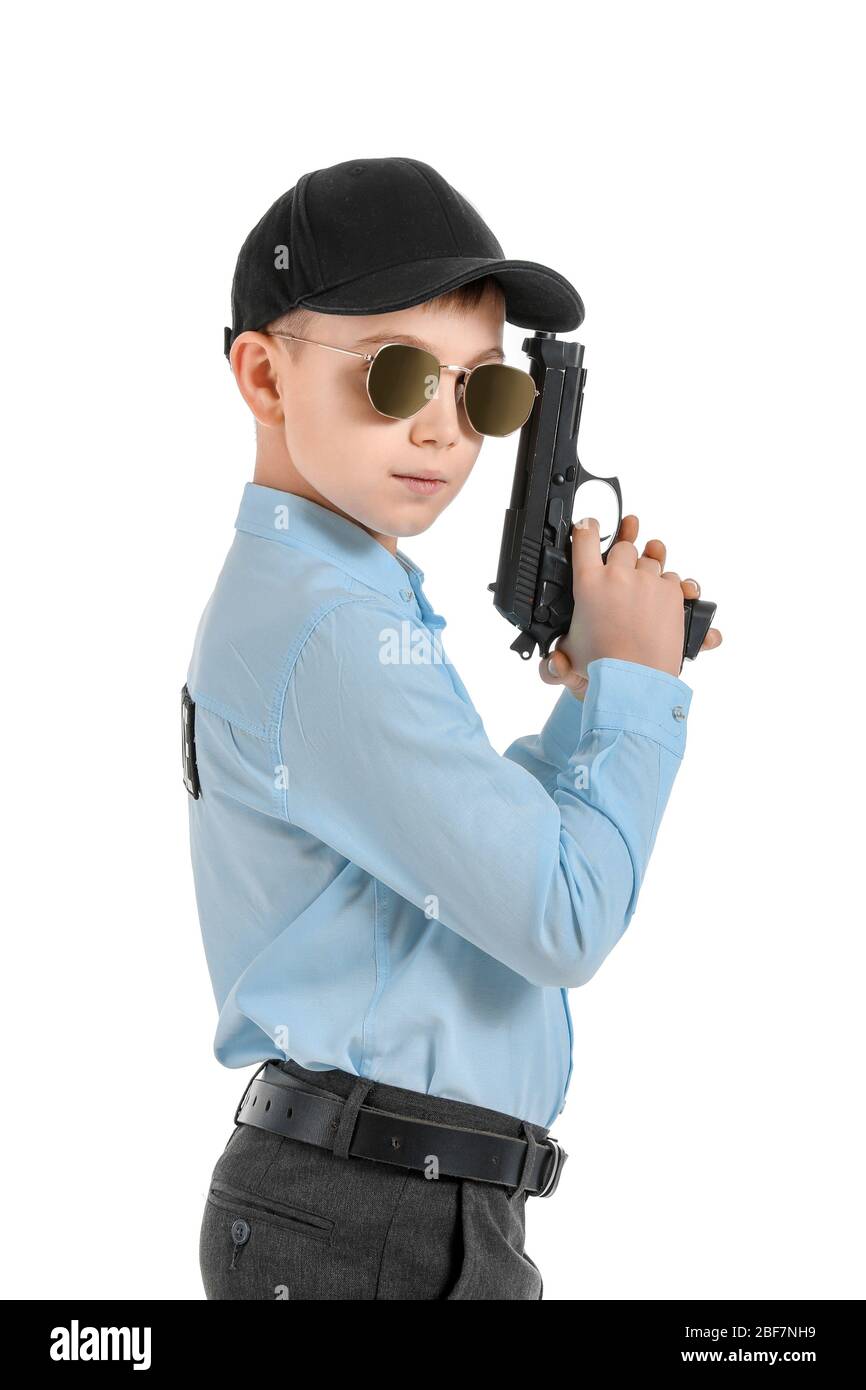 Cute little police officer on white background Stock Photo - Alamy
