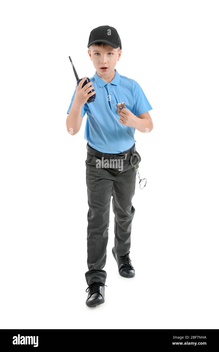 Cute little police officer on white background Stock Photo - Alamy