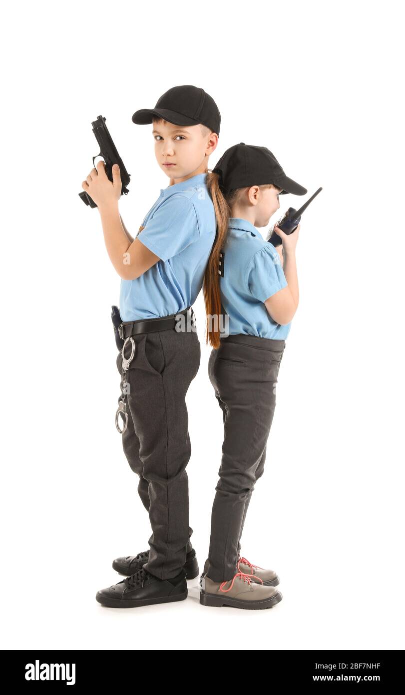 Cute little police officers on white background Stock Photo - Alamy