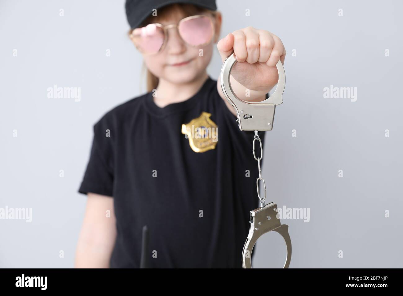 Child handcuffs hi-res stock photography and images - Alamy