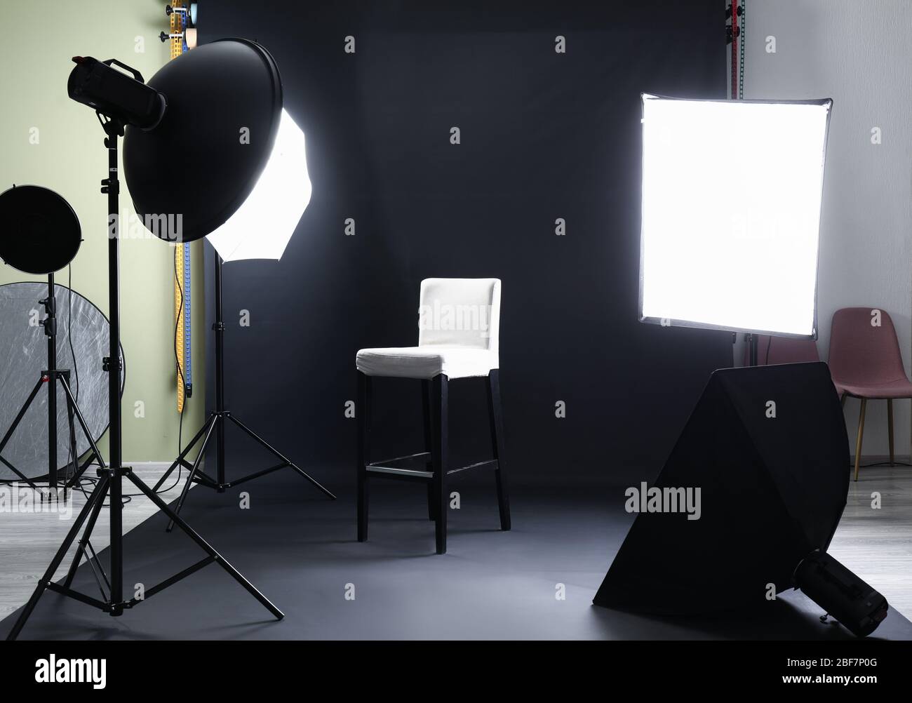 Chair and equipment in modern photo studio Stock Photo - Alamy