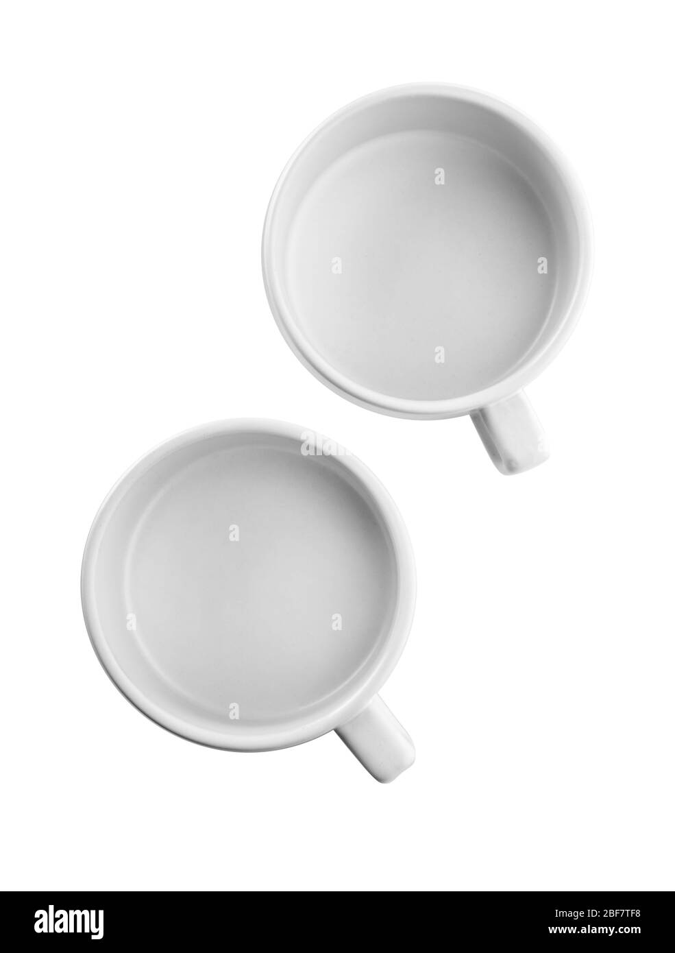 Empty cups on white background Stock Photo - Alamy