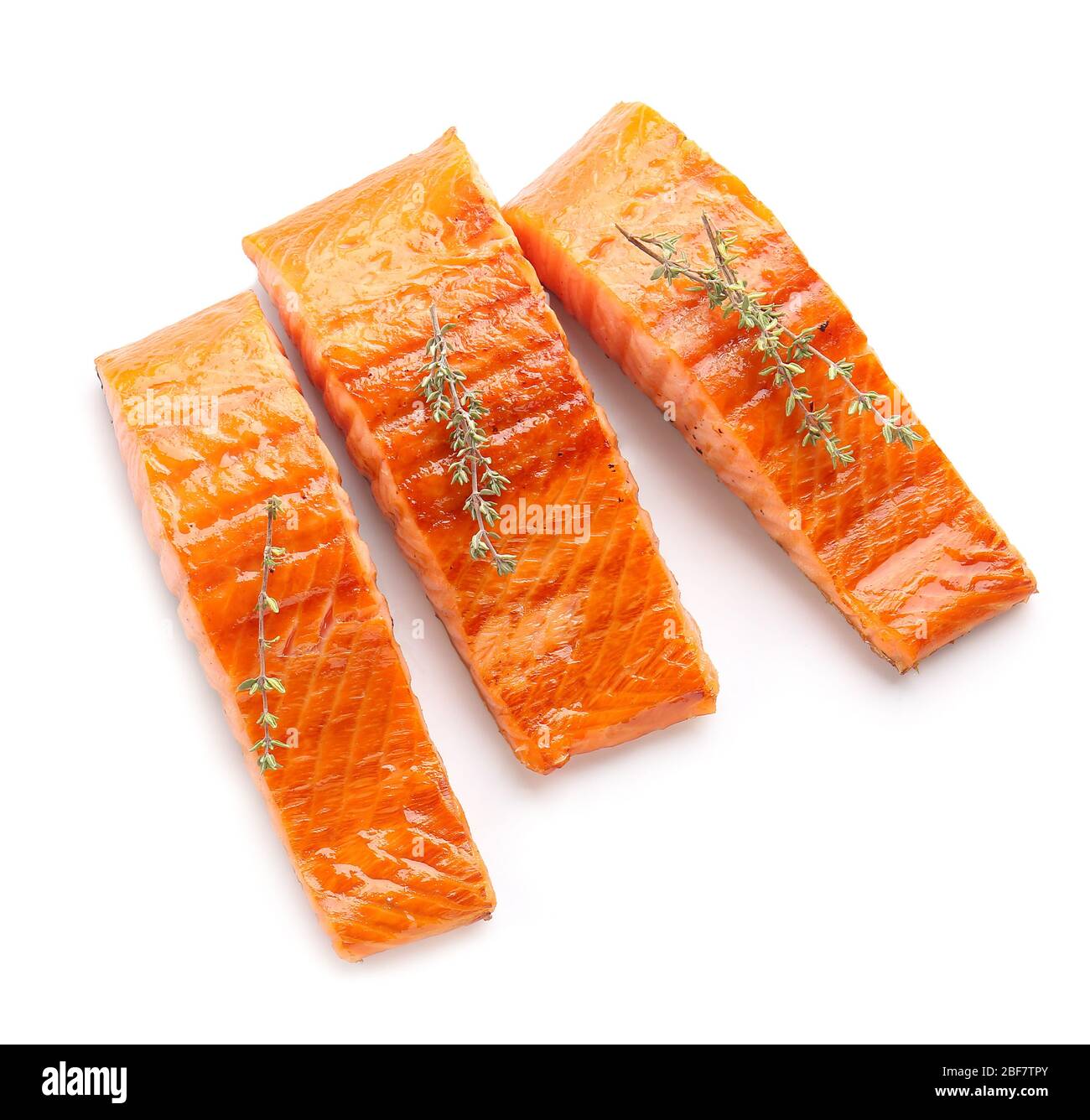 Cooked salmon fillet on white background Stock Photo - Alamy