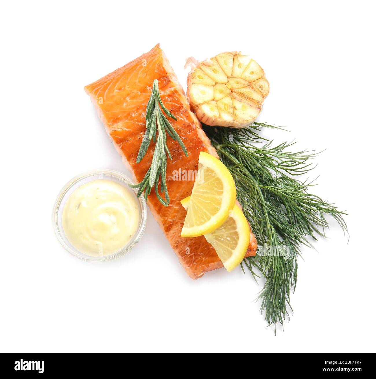Cooked salmon fillet with sauce on white background Stock Photo - Alamy