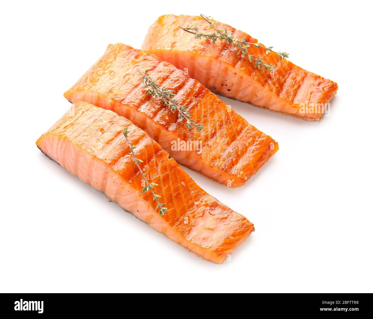 Cooked salmon fillet on white background Stock Photo - Alamy