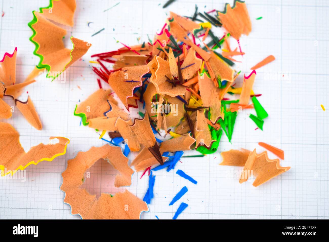 Pencil shavings from different colored pencil crayons scattered across ...