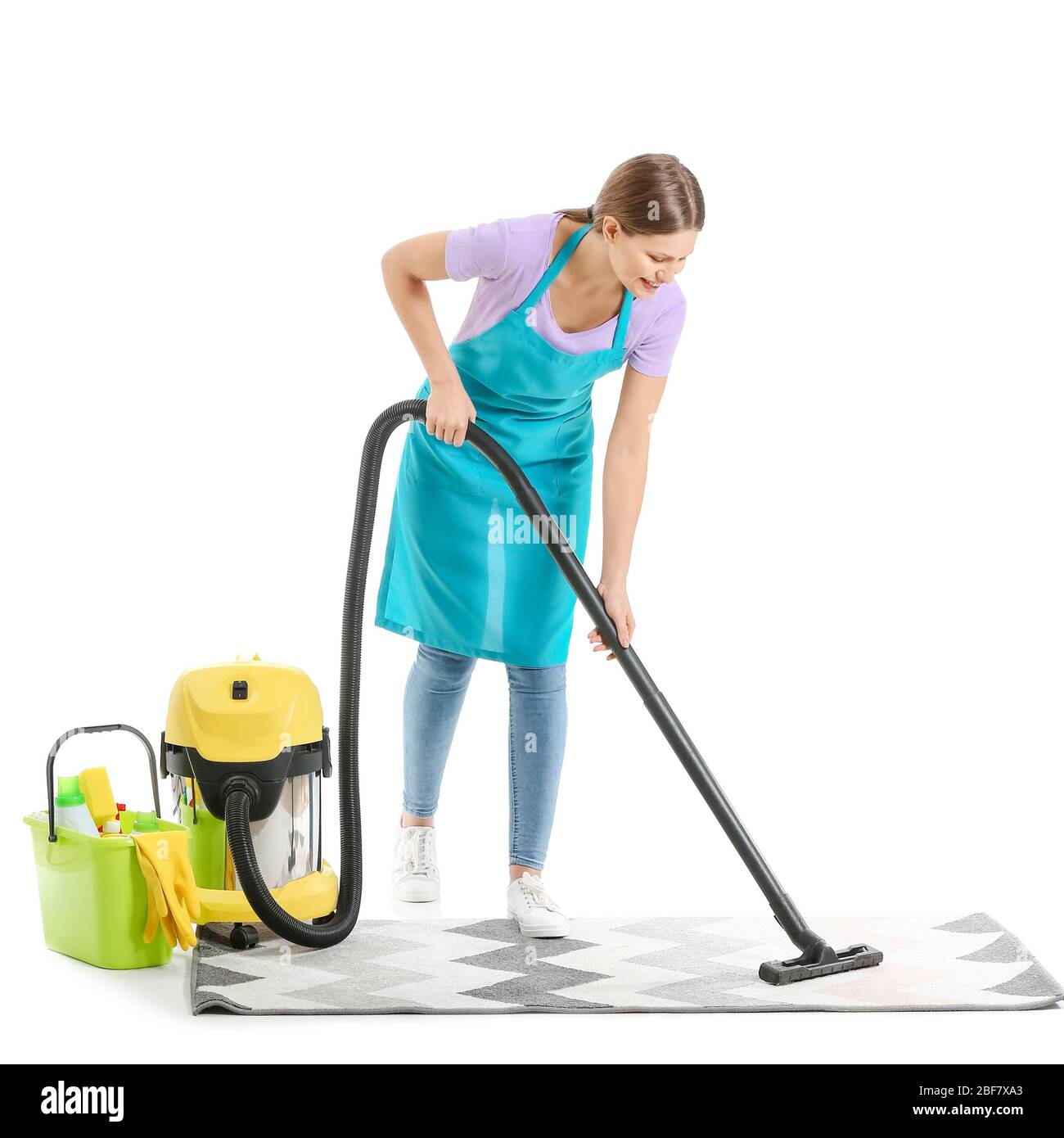 Woman hoovering Cut Out Stock Images & Pictures - Alamy