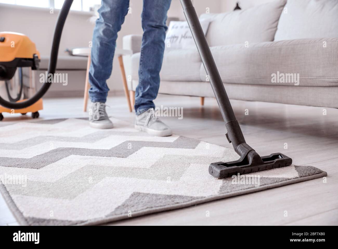 Hoovering legs hi-res stock photography and images - Alamy