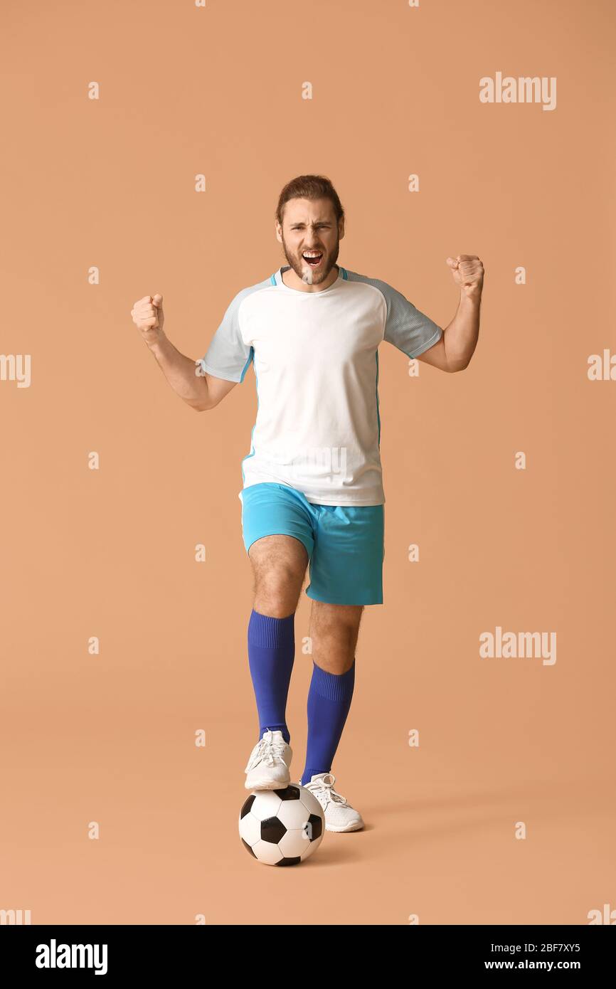Happy football player hi-res stock photography and images - Alamy