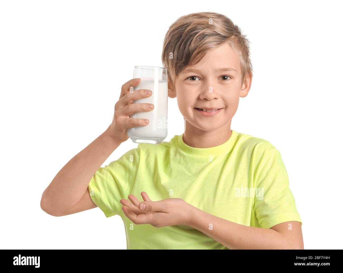 Little boy with milk on white background Stock Photo - Alamy