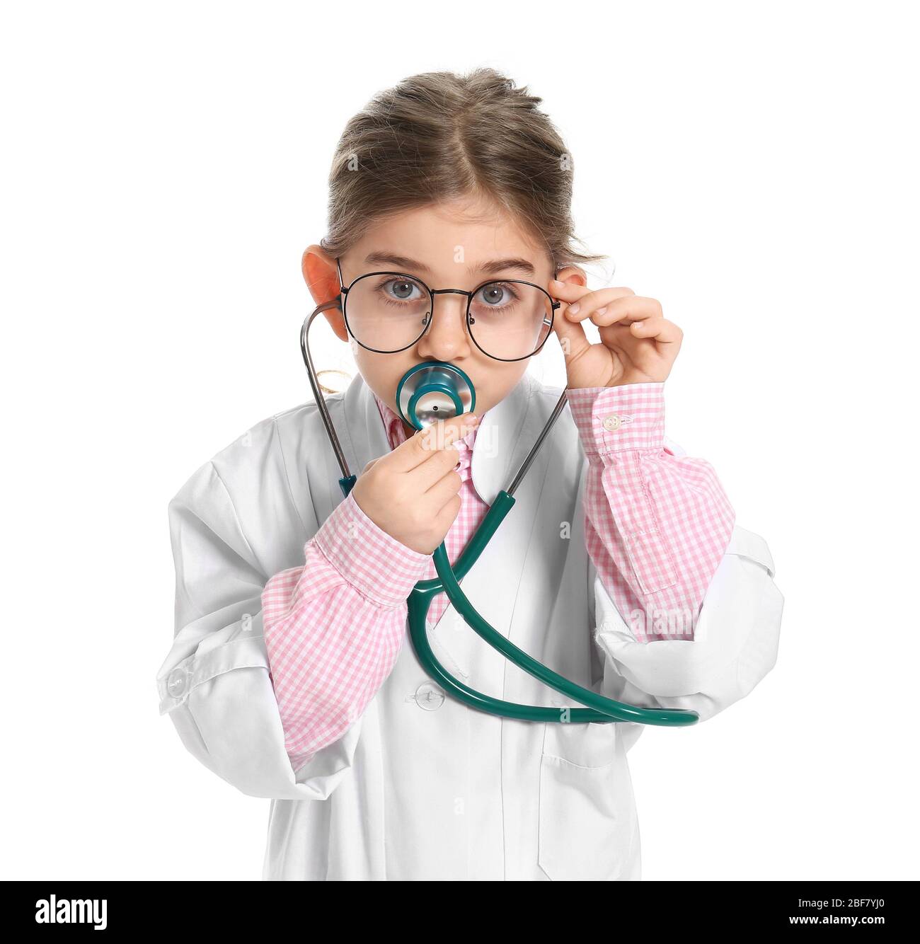 Cute little doctor on white background Stock Photo - Alamy