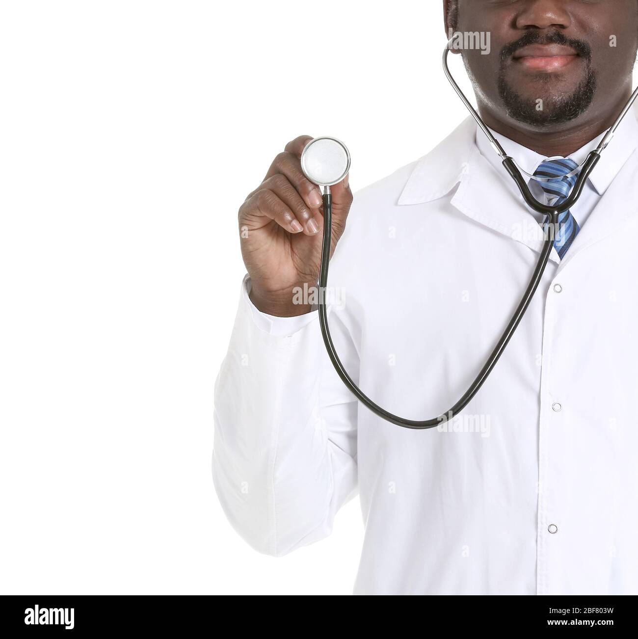 Male African-American doctor with stethoscope on white background Stock ...