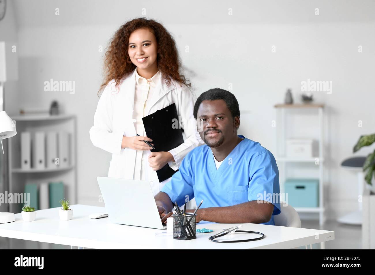 African doctors clinic table hi-res stock photography and images - Alamy