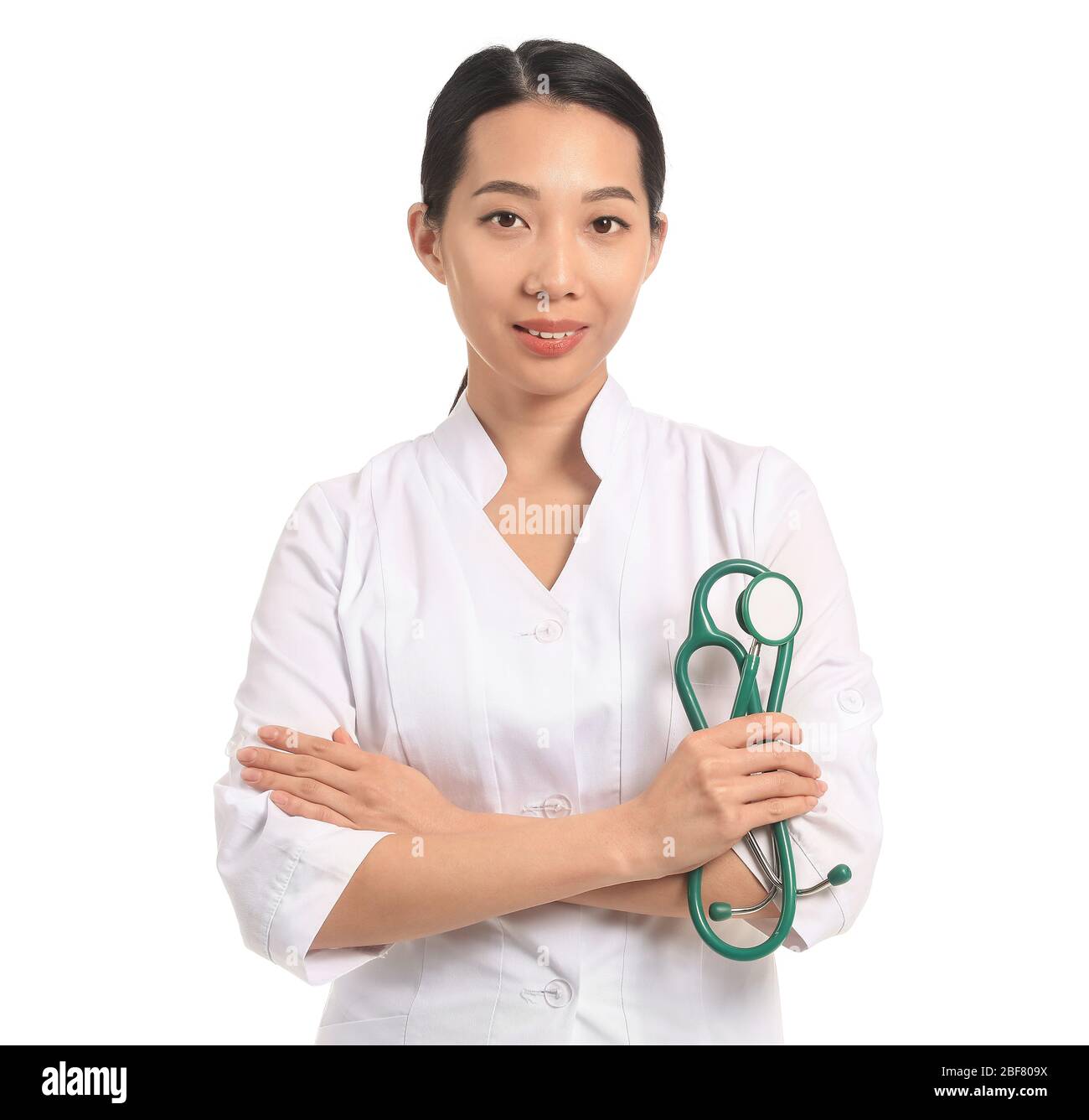 Female Asian doctor on white background Stock Photo - Alamy