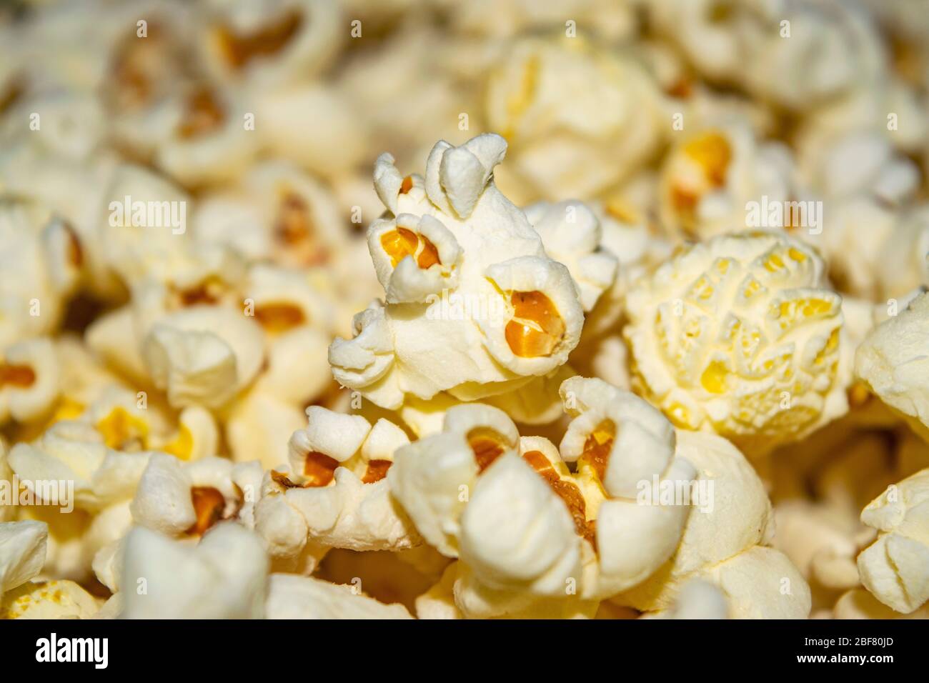 Popcorn surface texture background image. Close up Stock Photo - Alamy