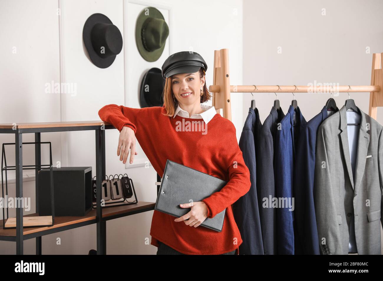 Female stylist in her modern studio Stock Photo - Alamy