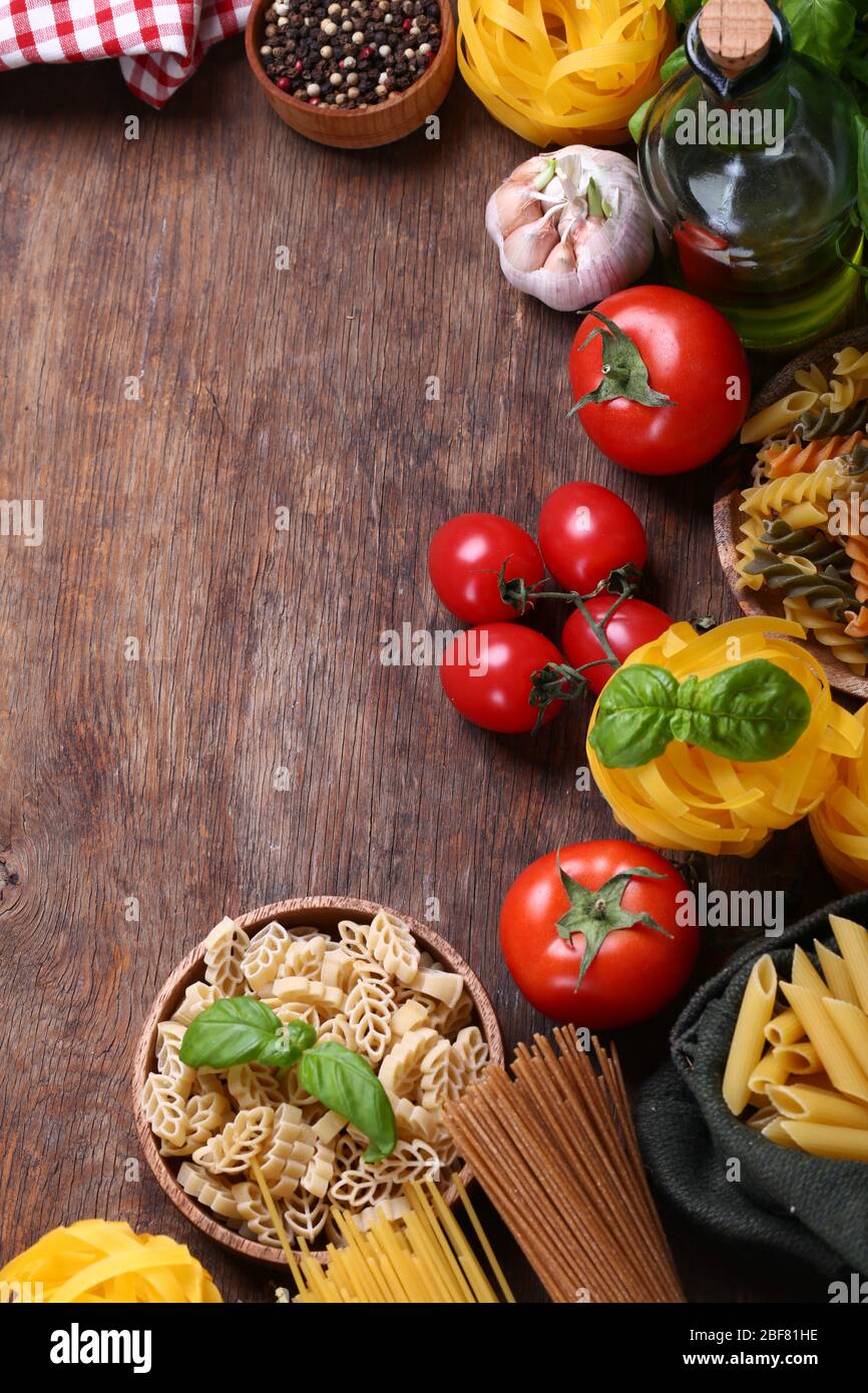 still life italian food pasta tomatoes garlic basil and olive oil Stock ...