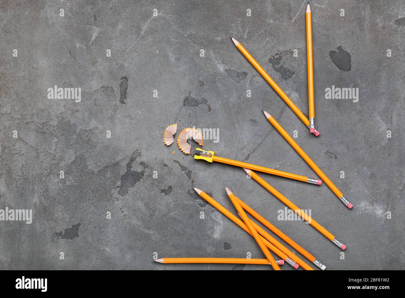 Ordinary pencils on grey background Stock Photo - Alamy