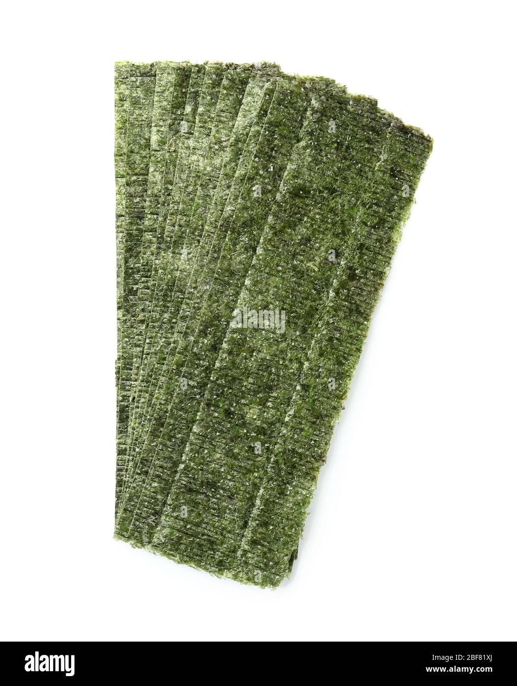 Tasty seaweed sheets on white background Stock Photo - Alamy