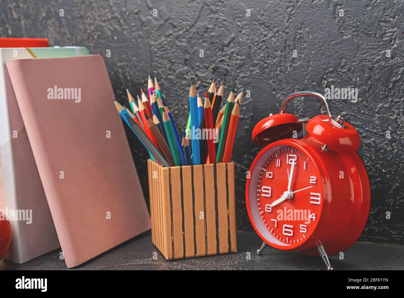 School books pencils clock hi-res stock photography and images - Alamy