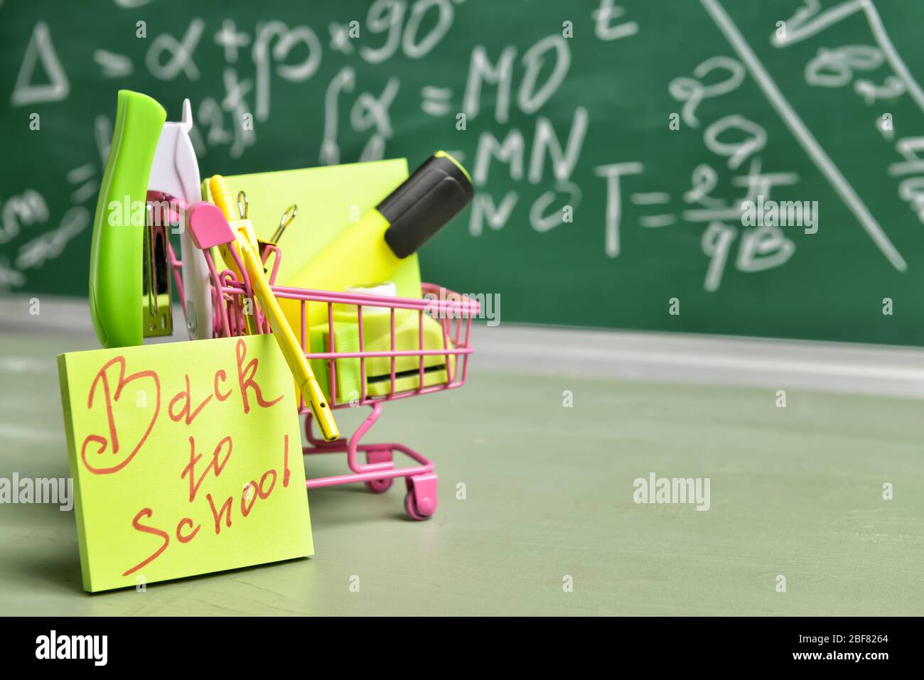 Shopping cart on blackboard in hi-res stock photography and images - Alamy