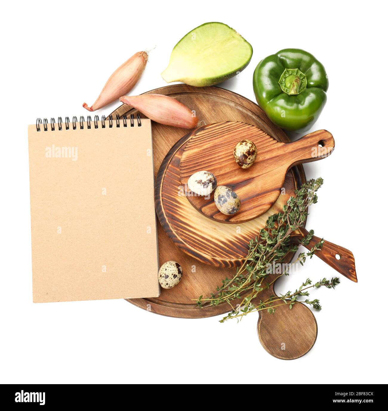 Cook book with products on white background Stock Photo - Alamy