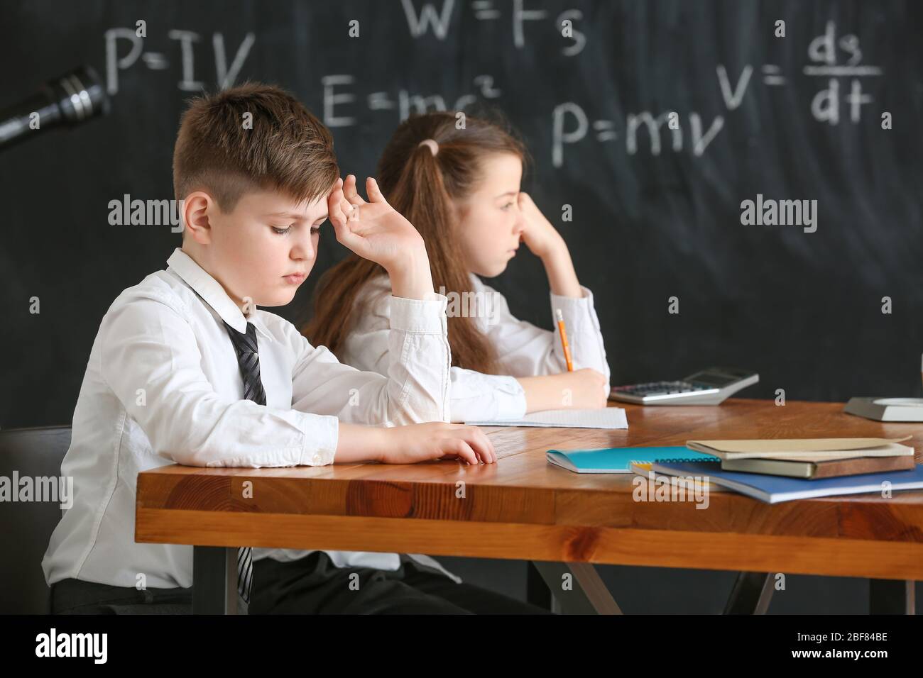 Cute little children at physics lesson in classroom Stock Photo - Alamy