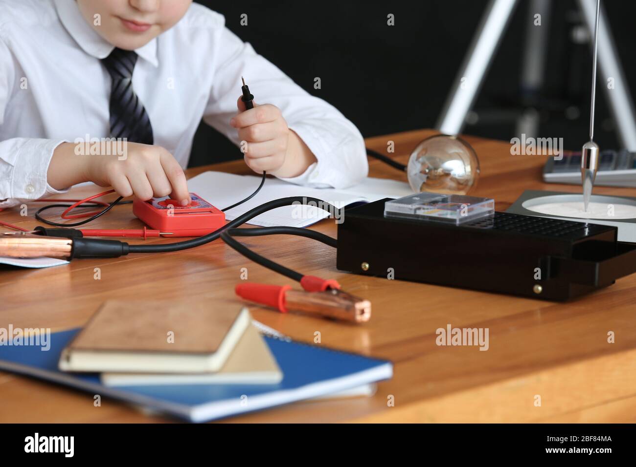 Cute little boy with tester in classroom Stock Photo - Alamy