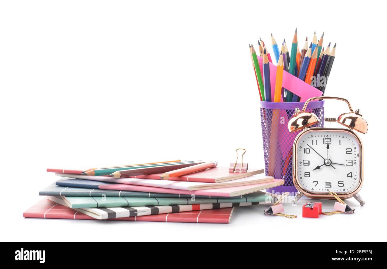 Set of school supplies and clock on white background. Time to study ...