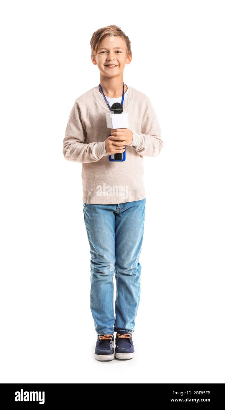Little journalist with microphone on white background Stock Photo - Alamy