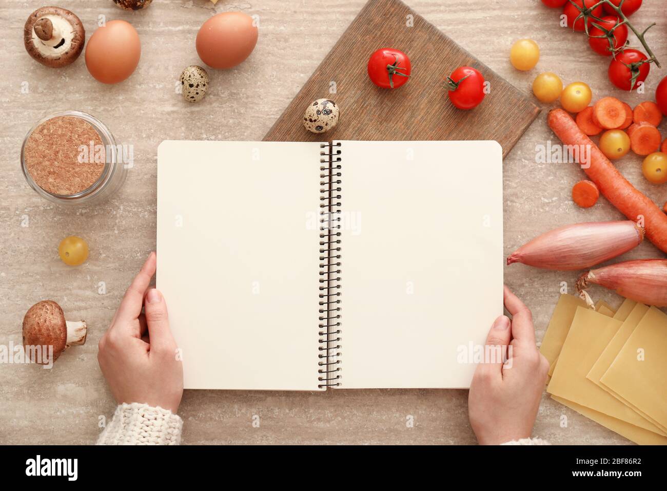 Woman cook book hi-res stock photography and images - Alamy