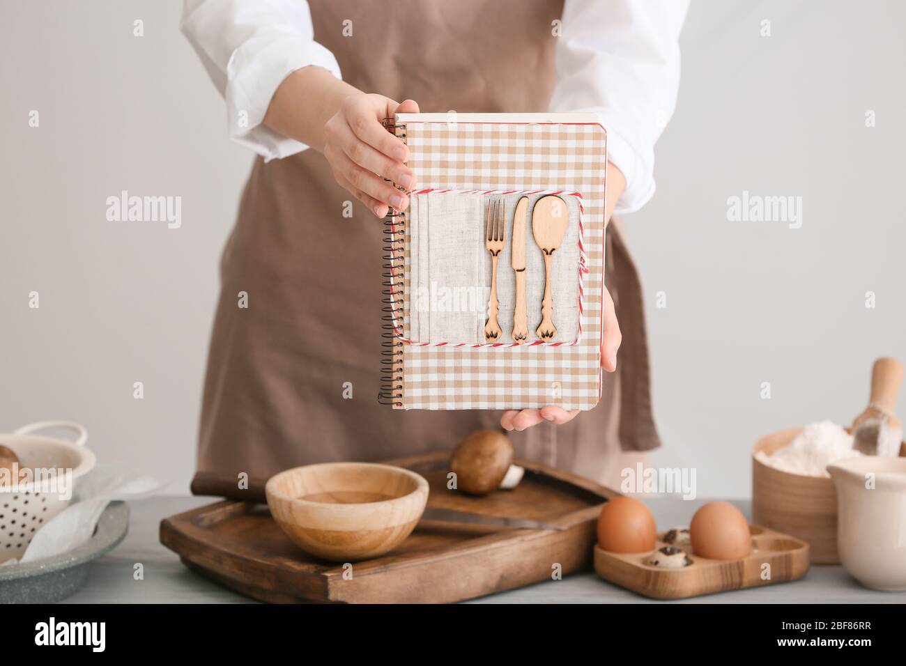 Woman cook book hi-res stock photography and images - Alamy