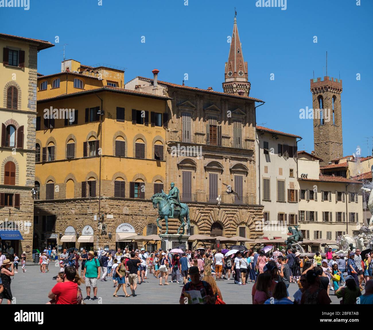 Tourists visiting the most famous attractions and monuments in old city ...