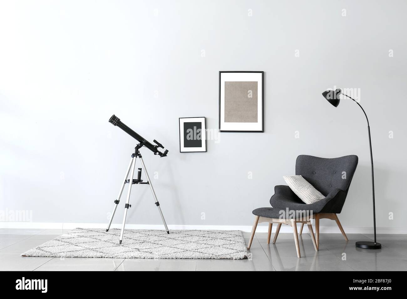 Interior of modern room with telescope Stock Photo - Alamy