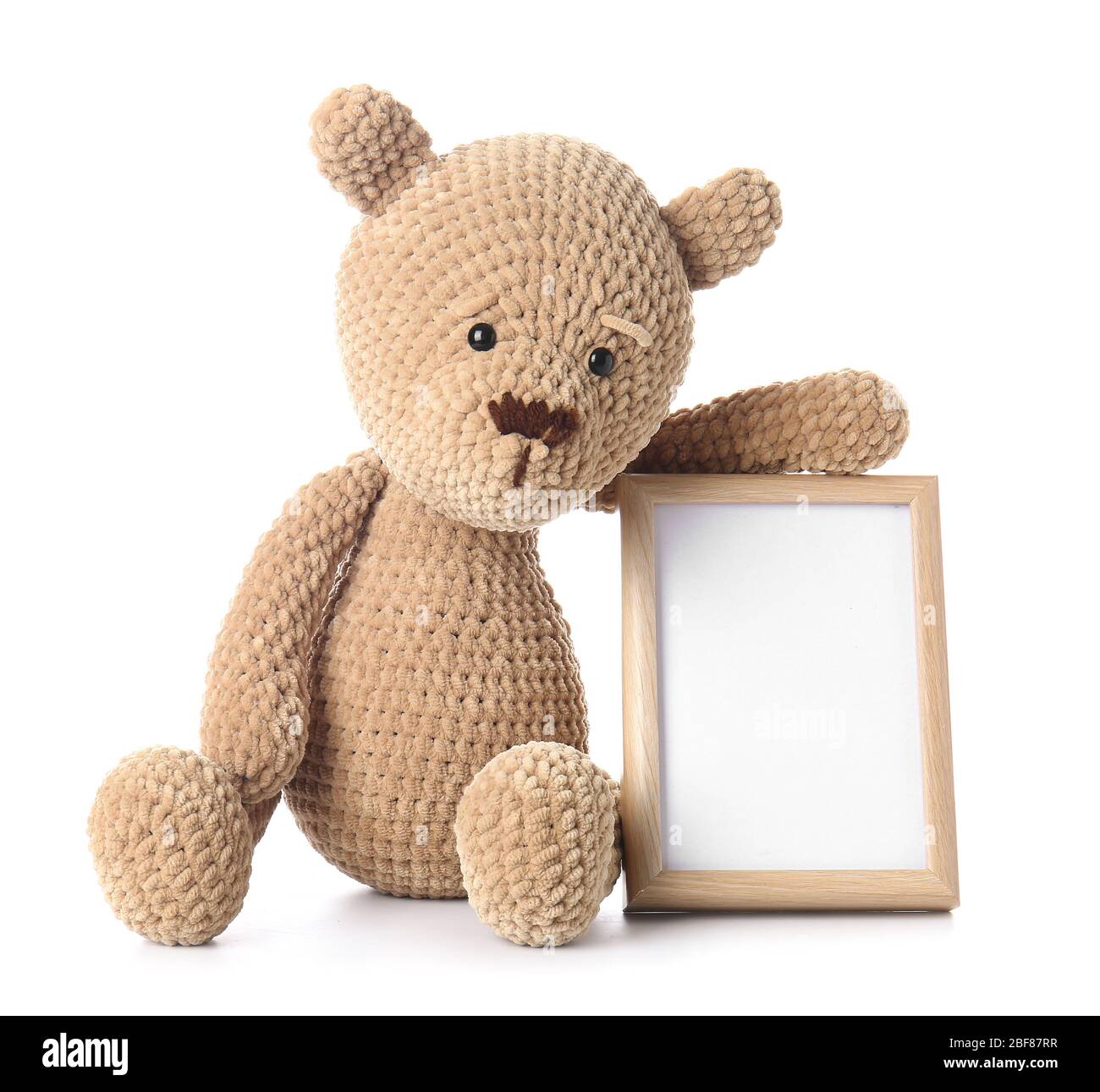 Teddy bear with photo frame on white background Stock Photo - Alamy