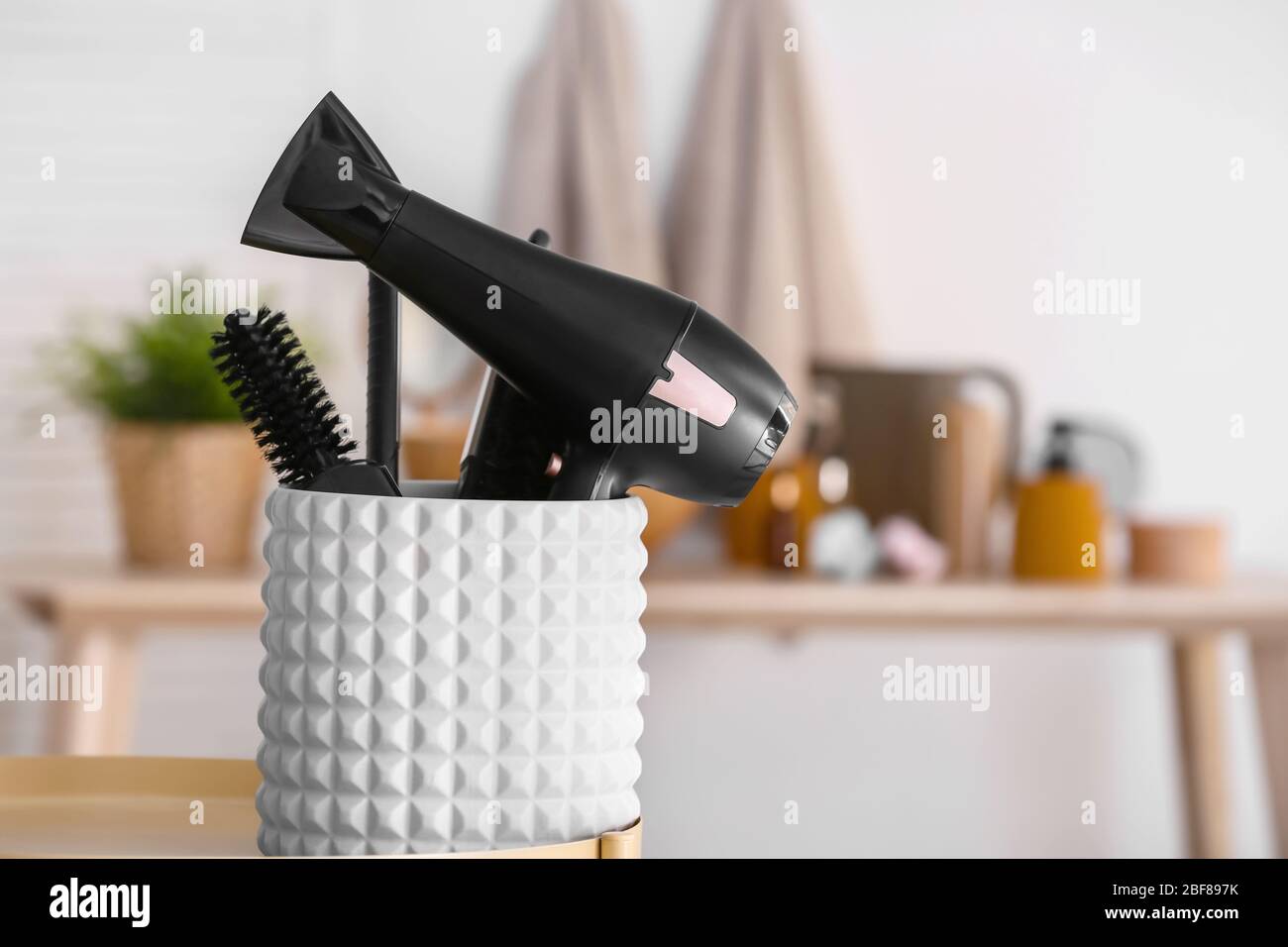 Modern blow dryer and hairdresser tools in salon Stock Photo - Alamy