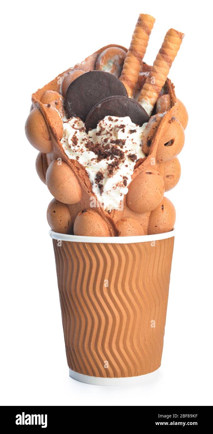 Delicious sweet bubble waffle in cup on white background Stock Photo ...