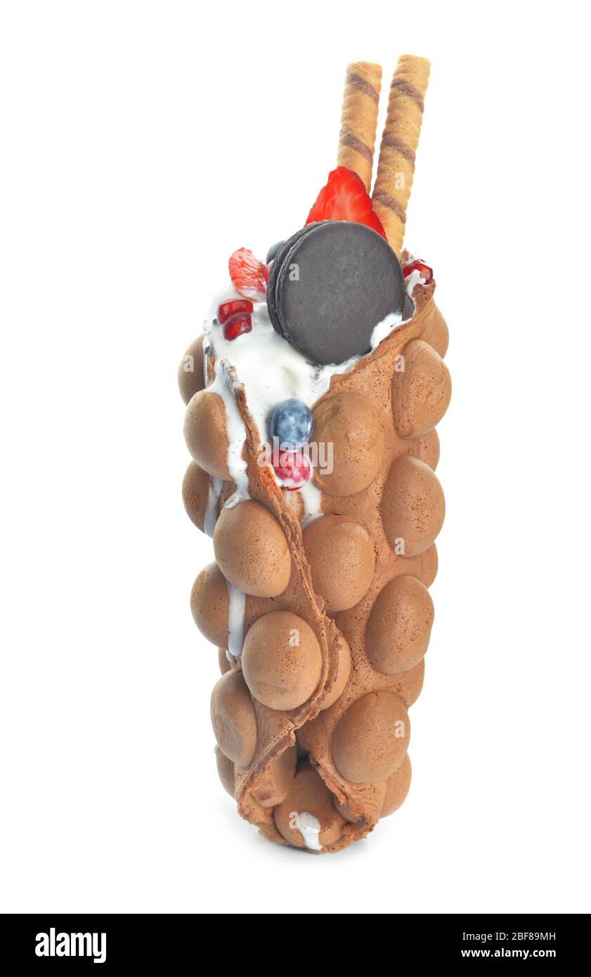Delicious sweet bubble waffle on white background Stock Photo - Alamy