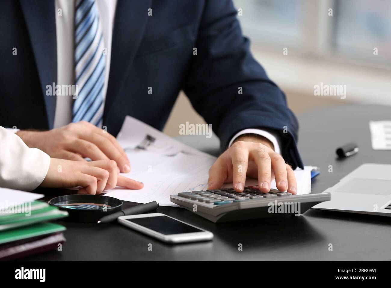 Male female accountants working hi-res stock photography and images - Alamy