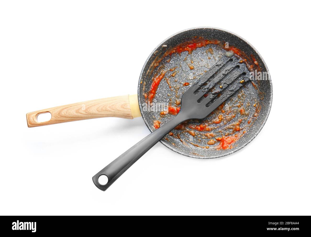 Dirty frying pan spatula hi-res stock photography and images - Alamy