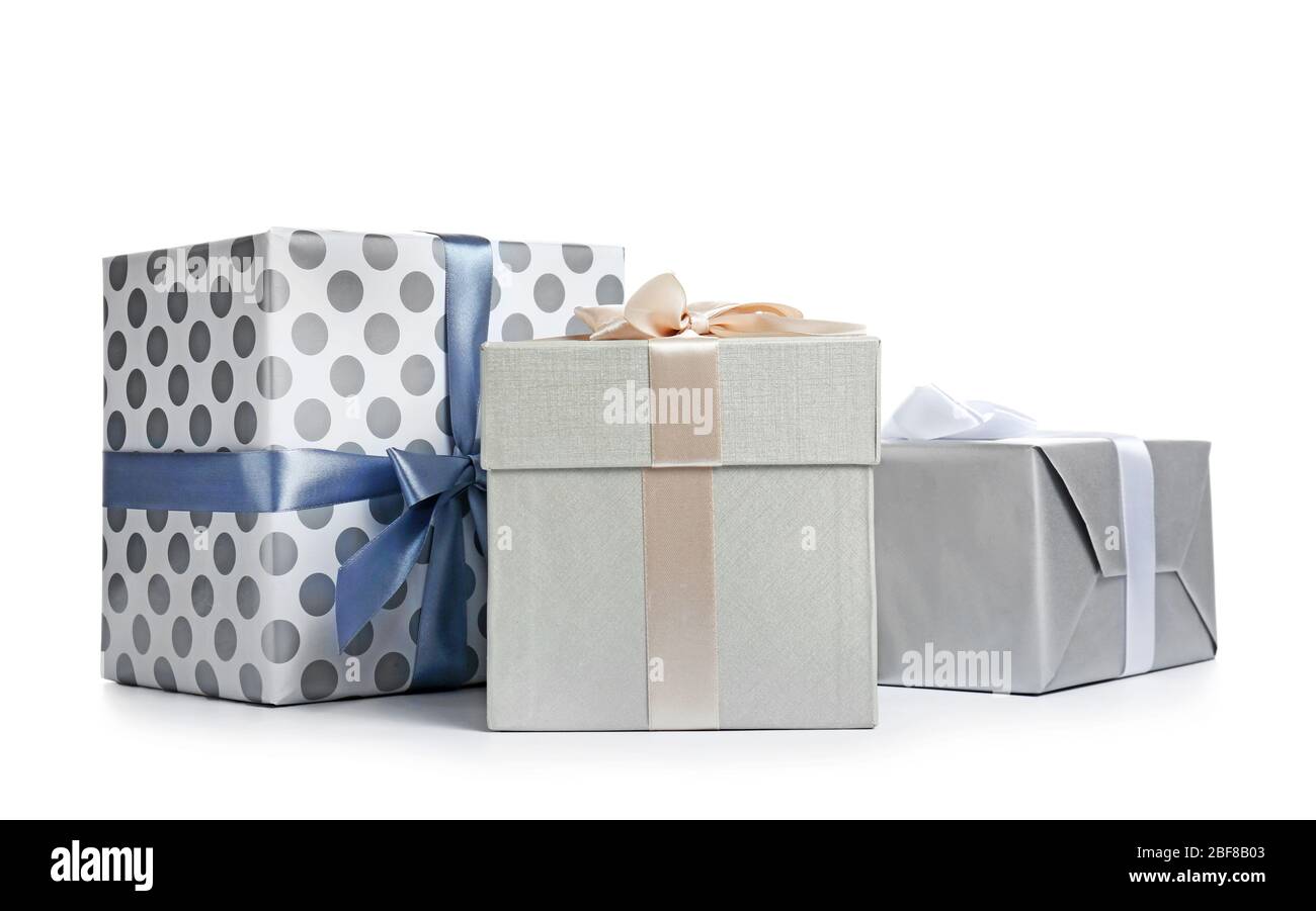Beautiful gift boxes on white background Stock Photo - Alamy