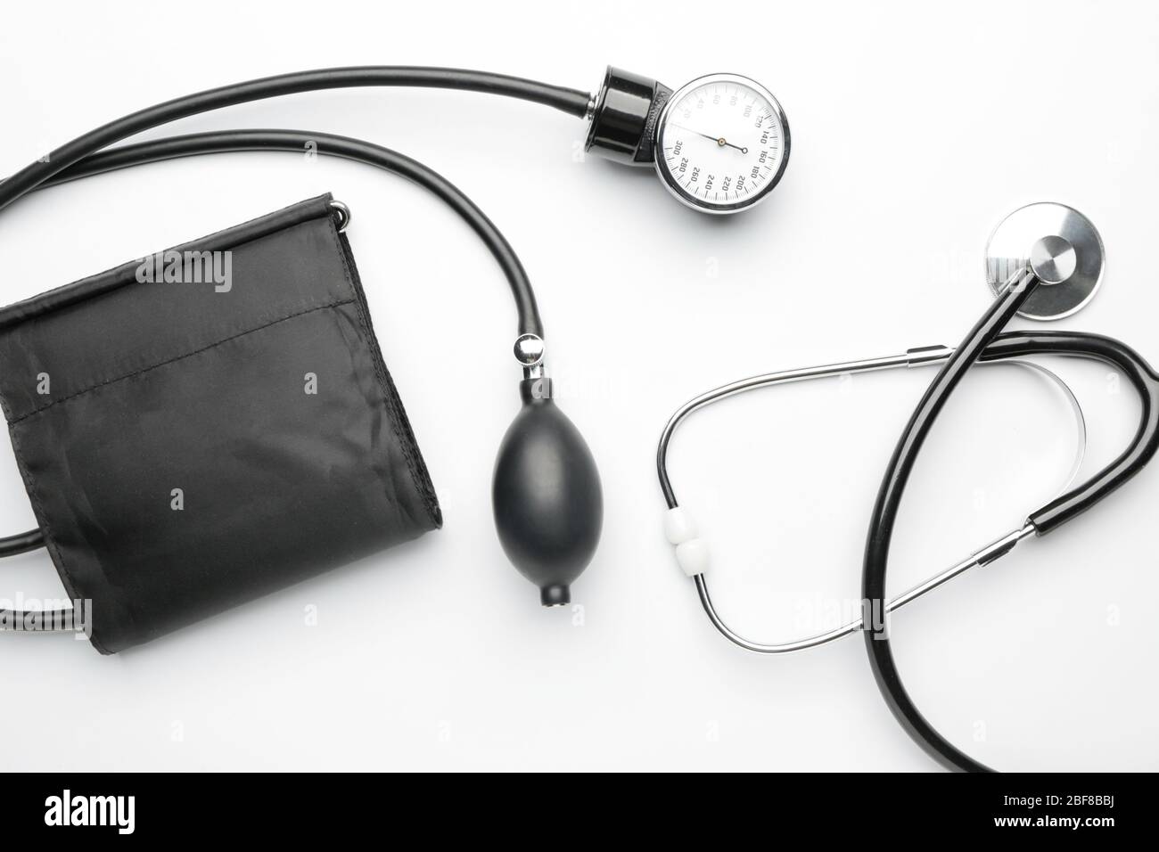 Stethoscope with sphygmomanometer on white background Stock Photo - Alamy
