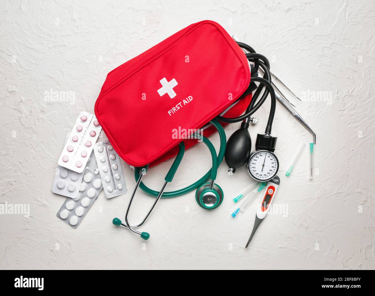First aid kit on white background Stock Photo - Alamy