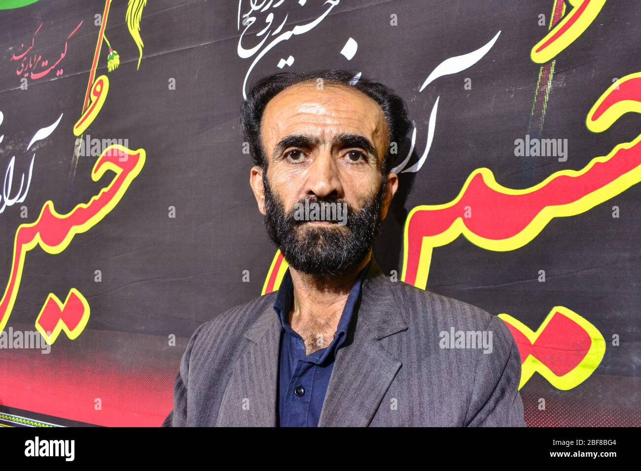 Isfahan, Iran - November 17, 2013: Portrait of Muslim man in front of ...