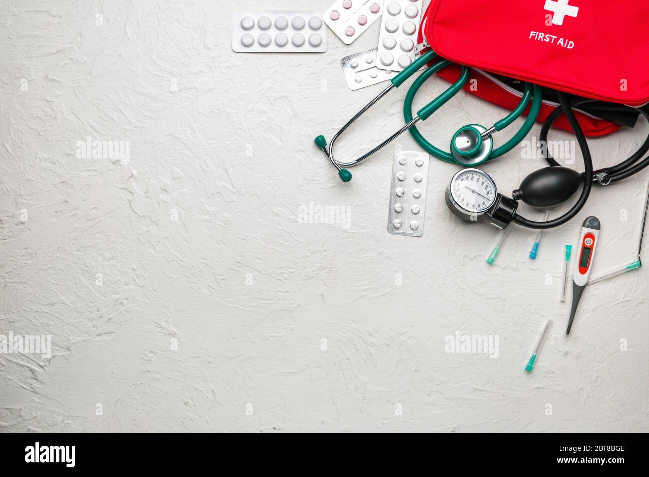 First aid kit on white background Stock Photo - Alamy