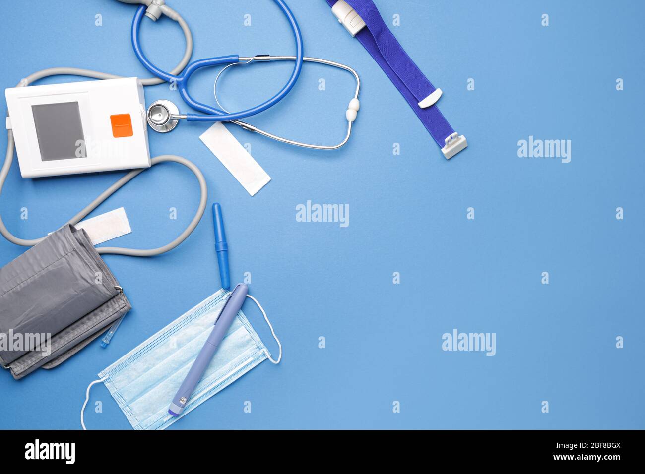 First aid kit on color background Stock Photo - Alamy