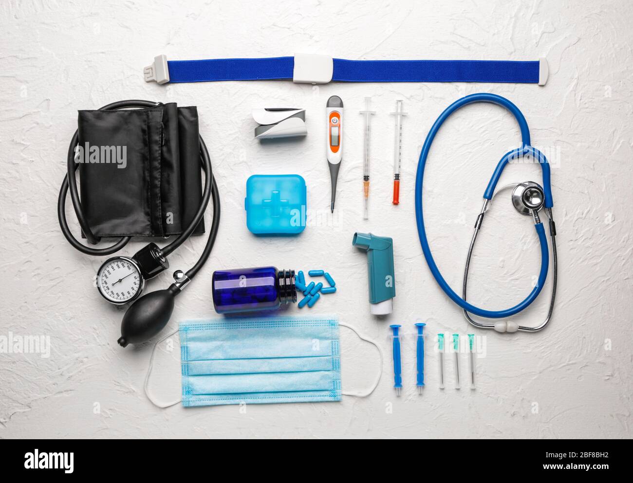 First aid kit on white background Stock Photo - Alamy