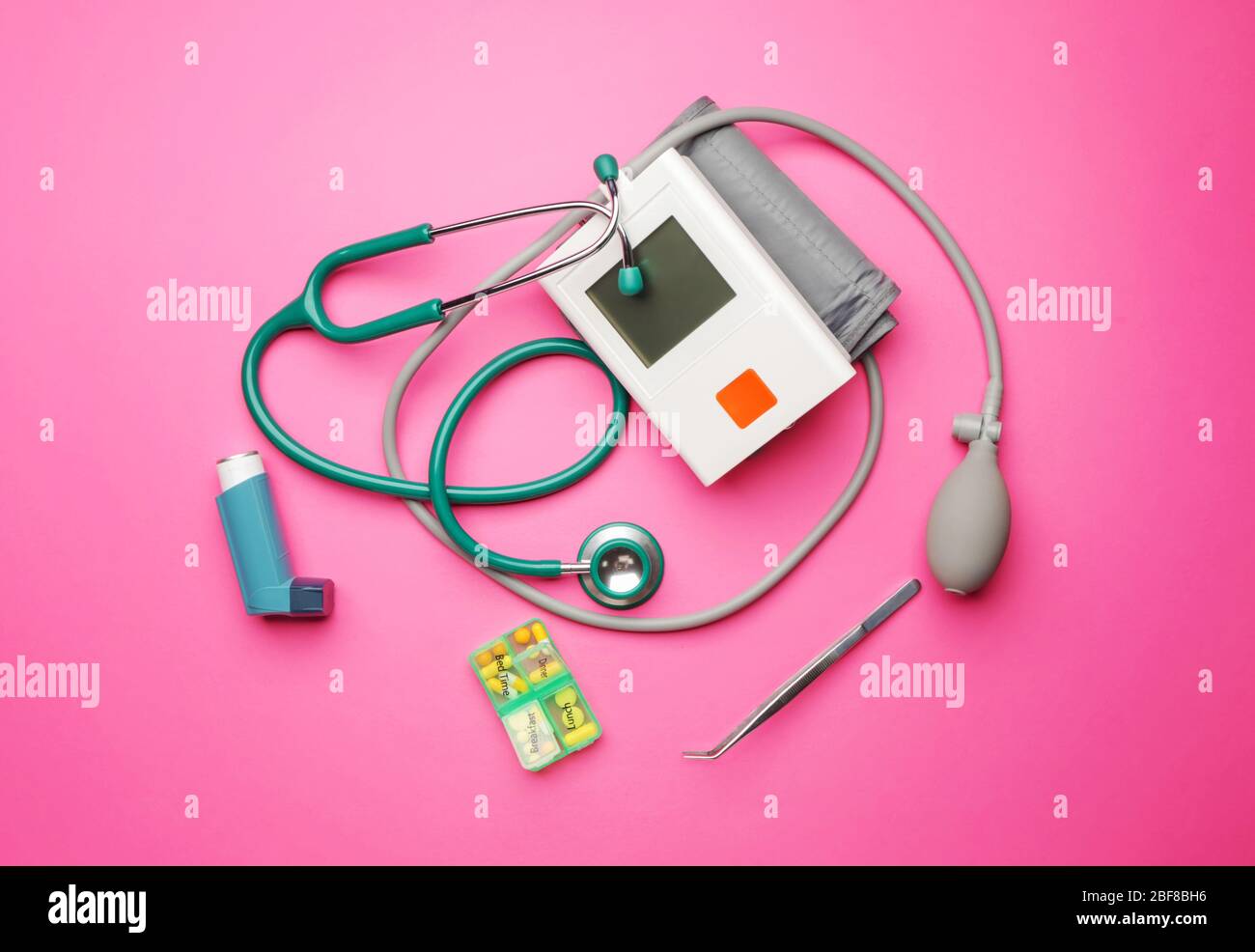 First aid kit on color background Stock Photo - Alamy