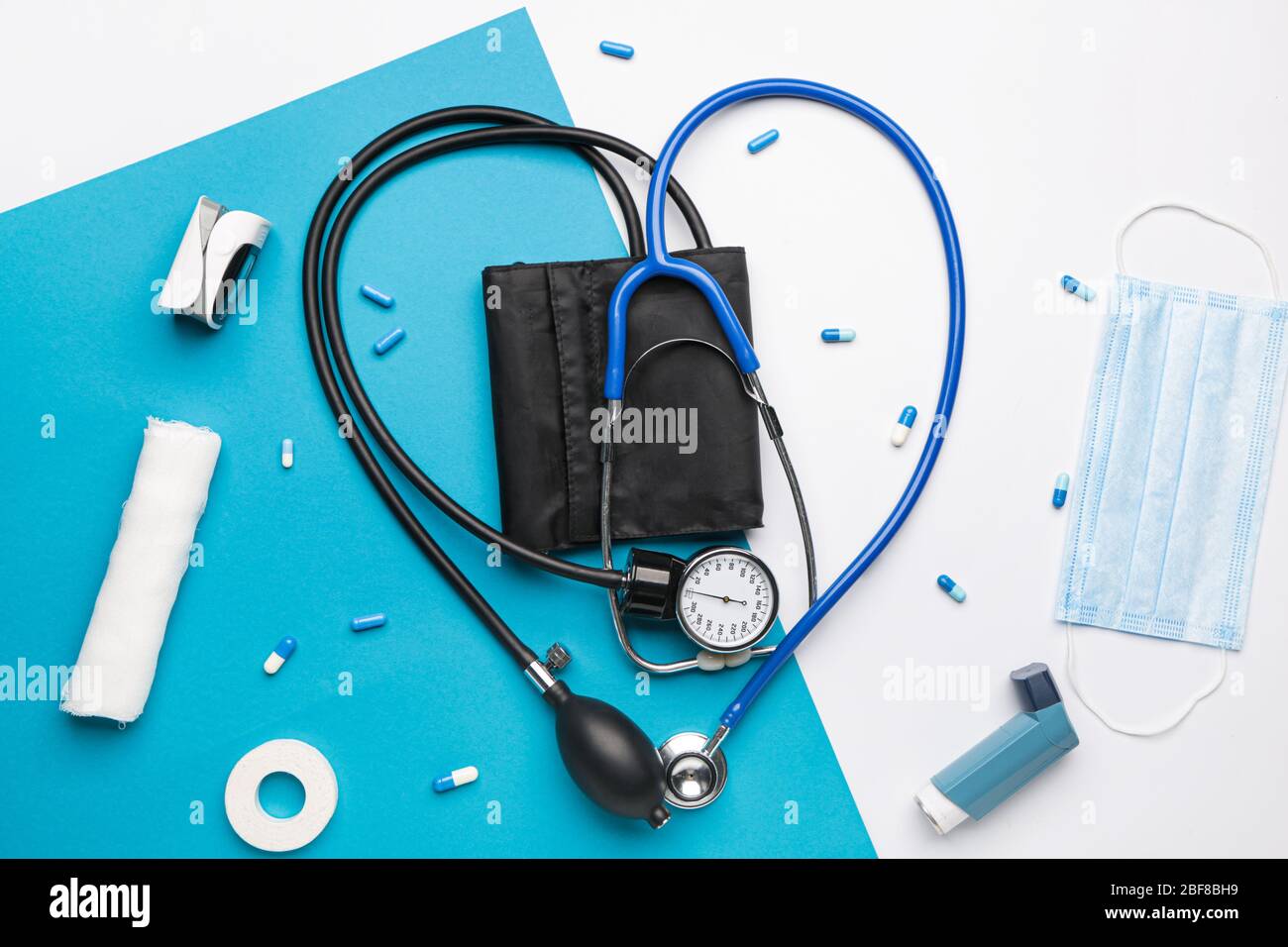 First aid kit on color background Stock Photo - Alamy