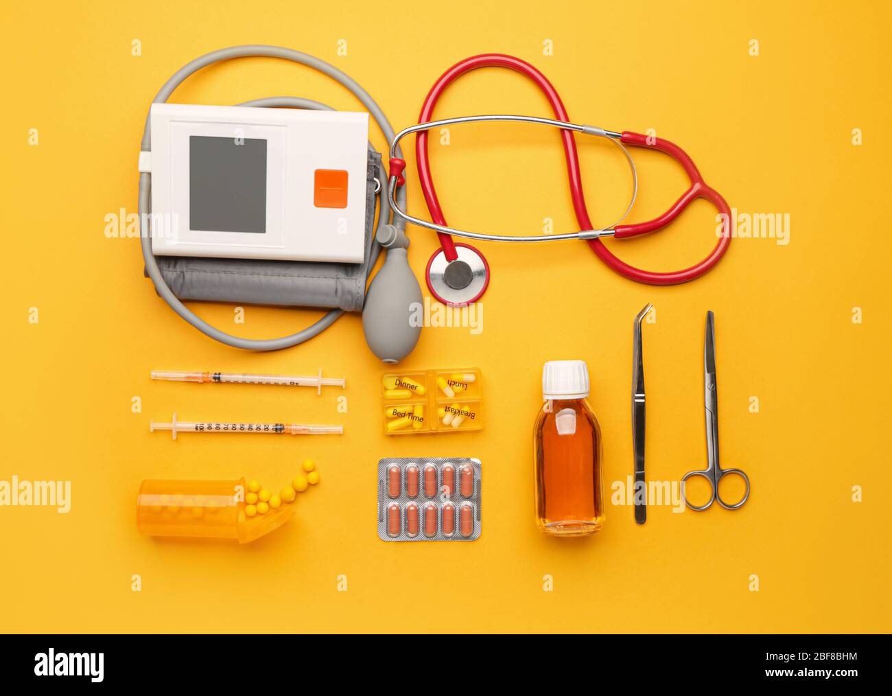 First aid kit on color background Stock Photo - Alamy